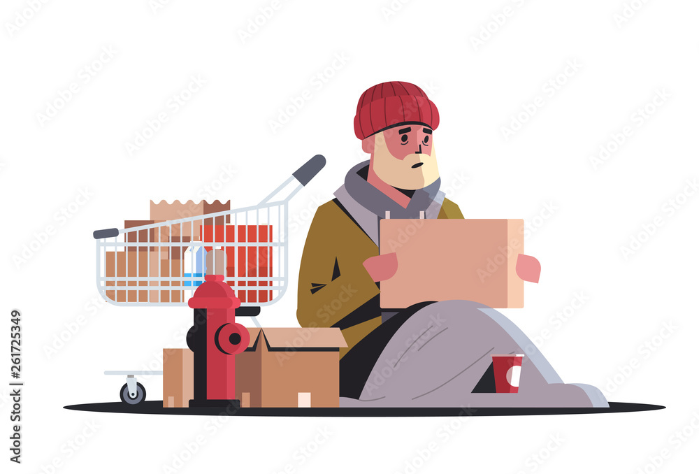 poor man with belongings in a trolley sitting on street begging for ...