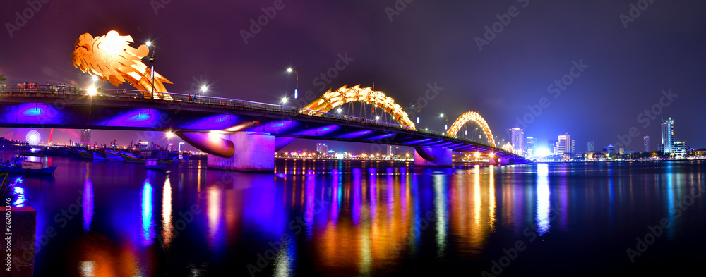Dragon Bridge in Da Nang, Vietnam. Panoramic picture of city skyline at ...