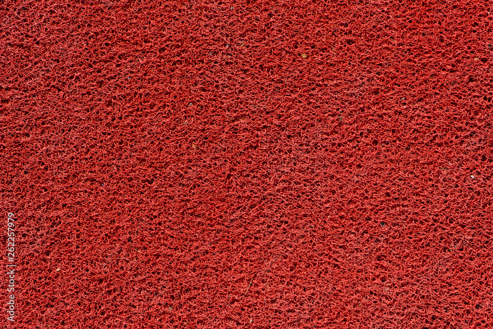 Detail of red rubber mat floor background texture Stock Photo | Adobe Stock