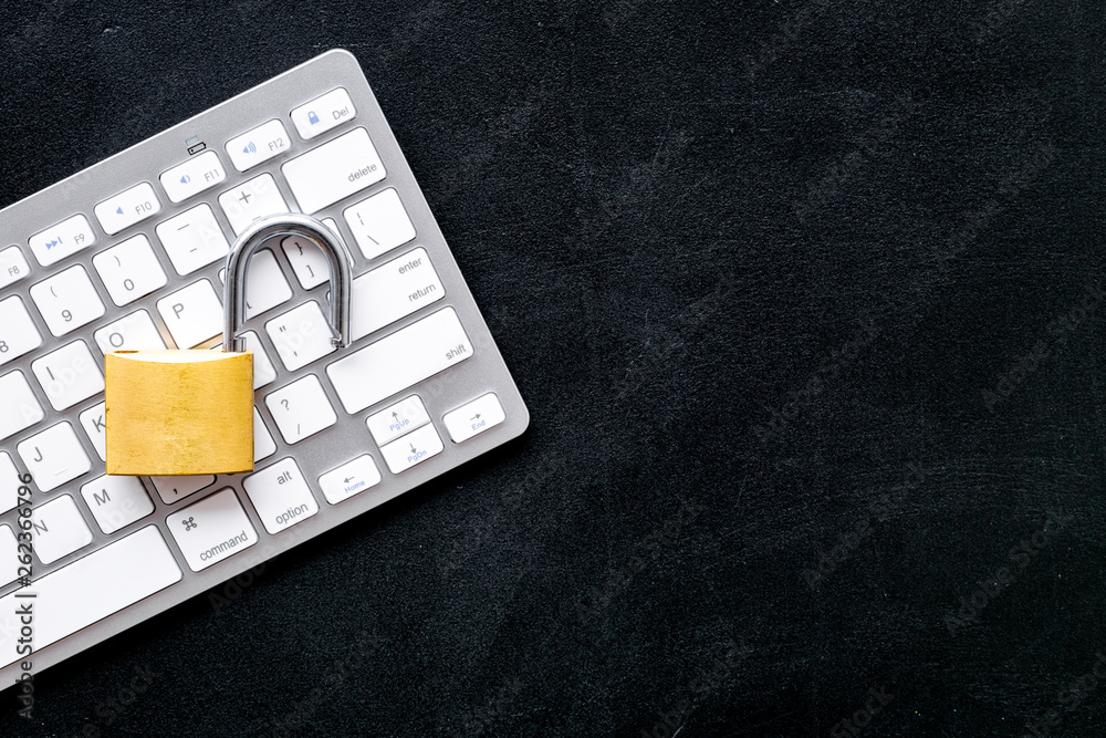 computer system protection from hacker with locker and keyboard on ...