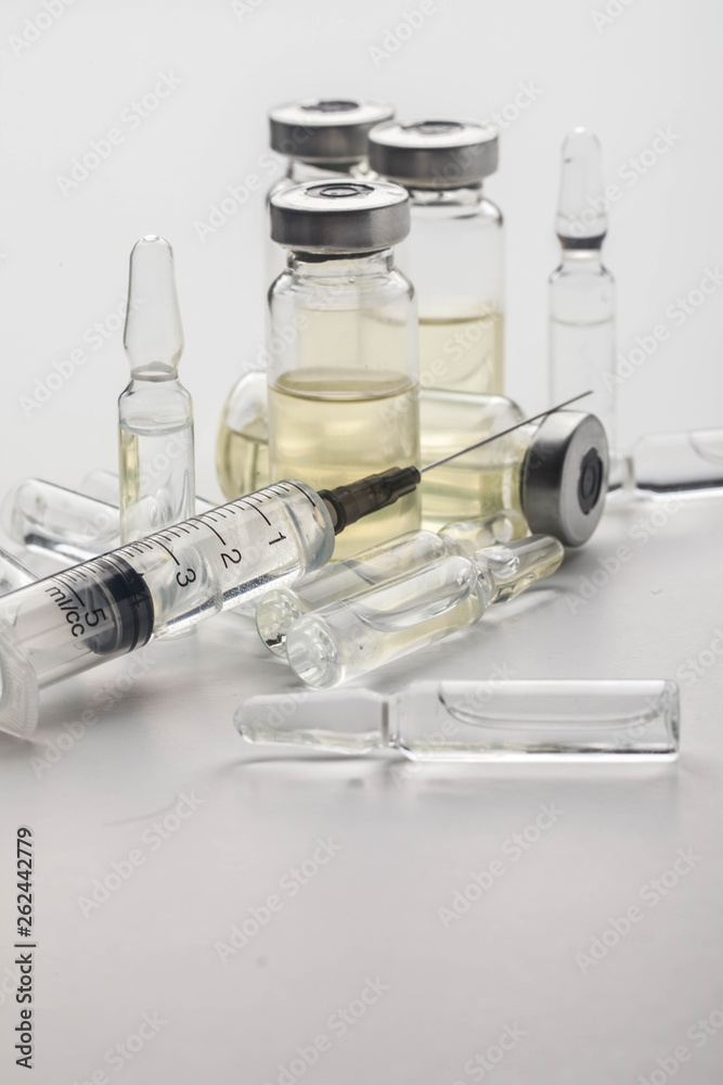 Subcutaneous syringe. Syringes with blue needles. Medical Injectors ...