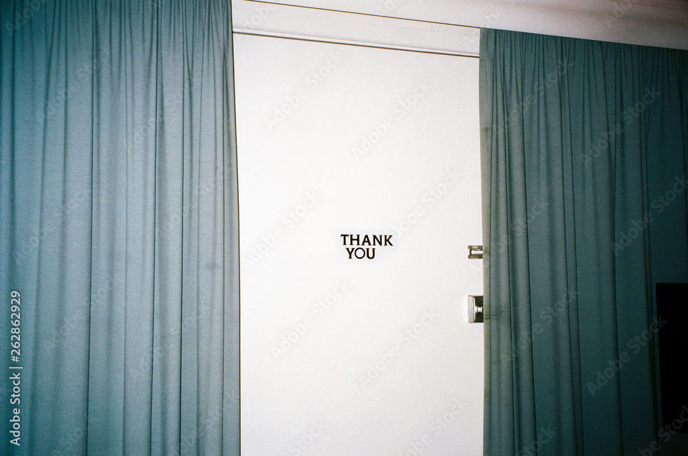 Thank You sign on interior motel door Stock Photo | Adobe Stock