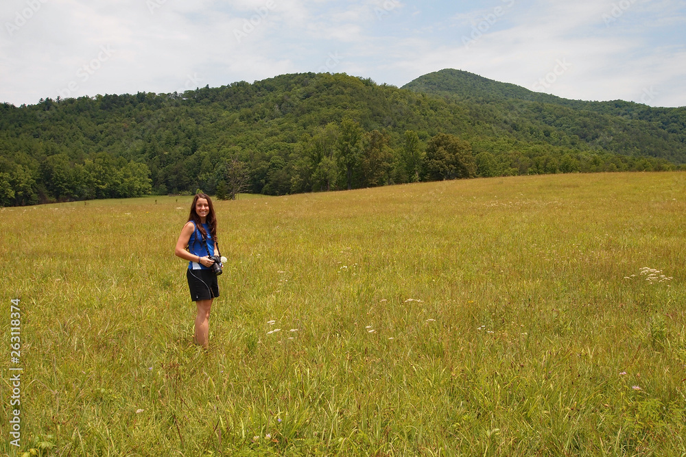 Young woman in Cades Cove in the Great Smoky Mountains National Park ...