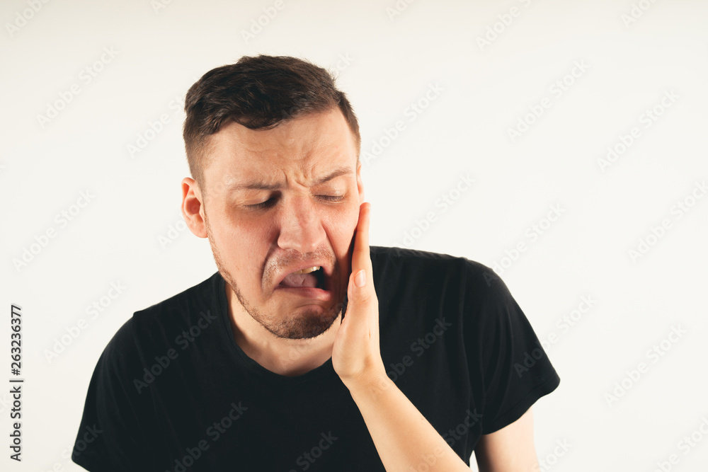 Crop person slapping scared man in face. Emotional male getting slapped ...