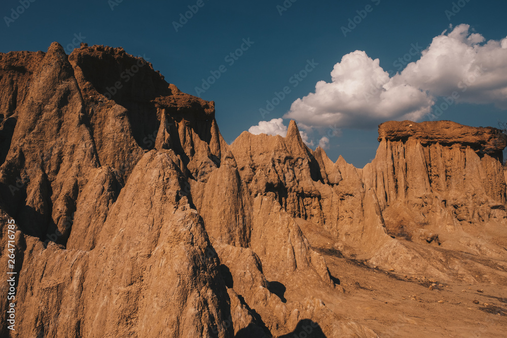 landscape of soil textures eroded sandstone pillars, columns and cliffs ...