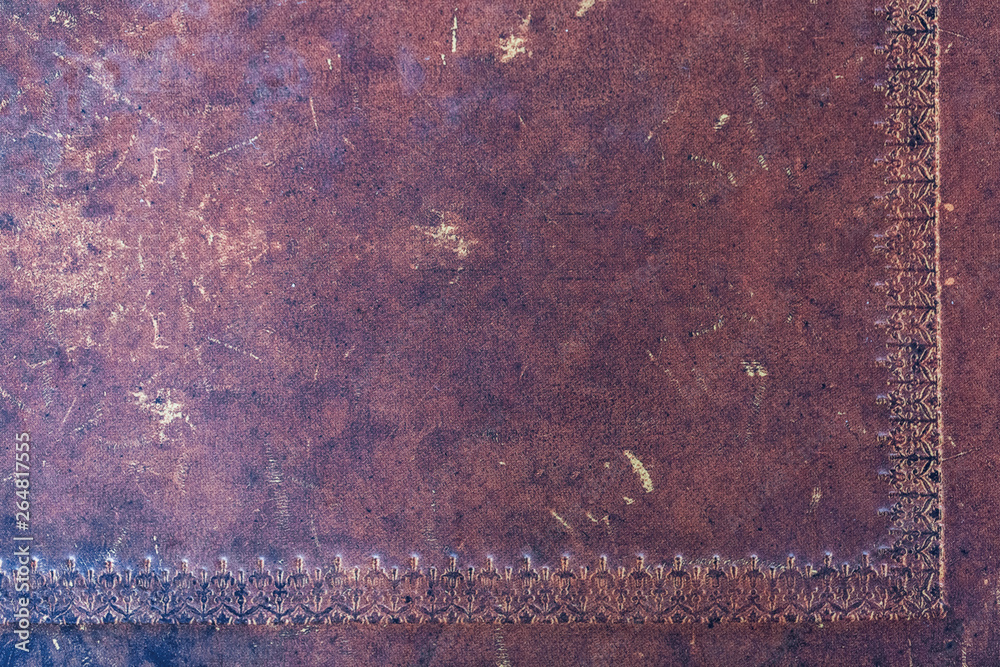 Structure of an old cover of books of red color with time marks in the ...