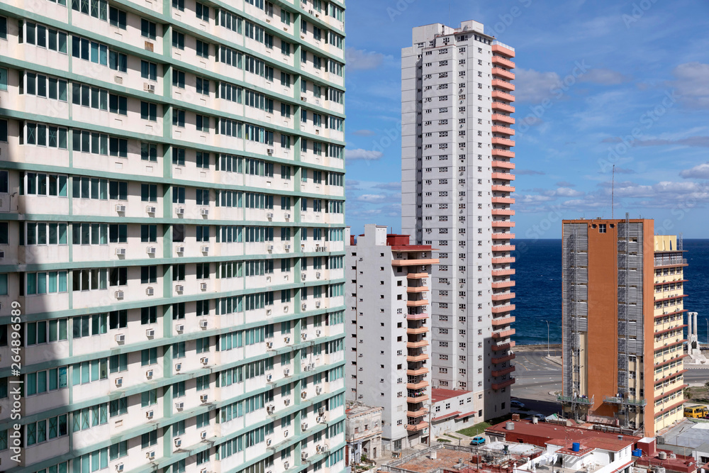 Classic High Rise Buildings in Havana Cuba on sunny day with water ...
