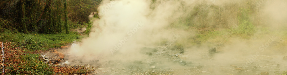 panorama showing the steam coming off the boiling thermal water springs ...