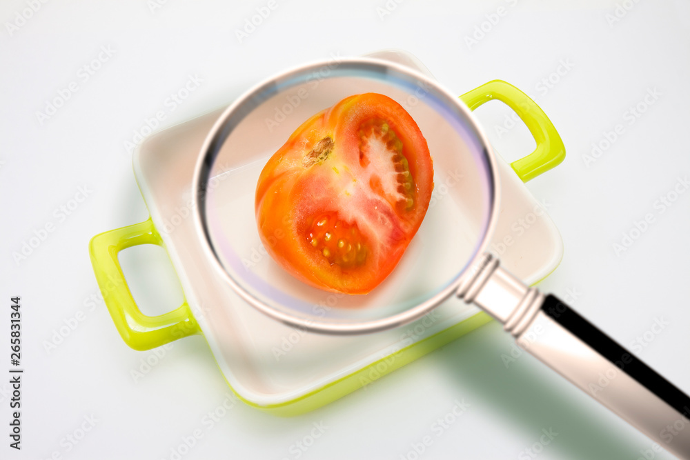 Sliced fresh tomato inside a ceramic container - concept image seen ...