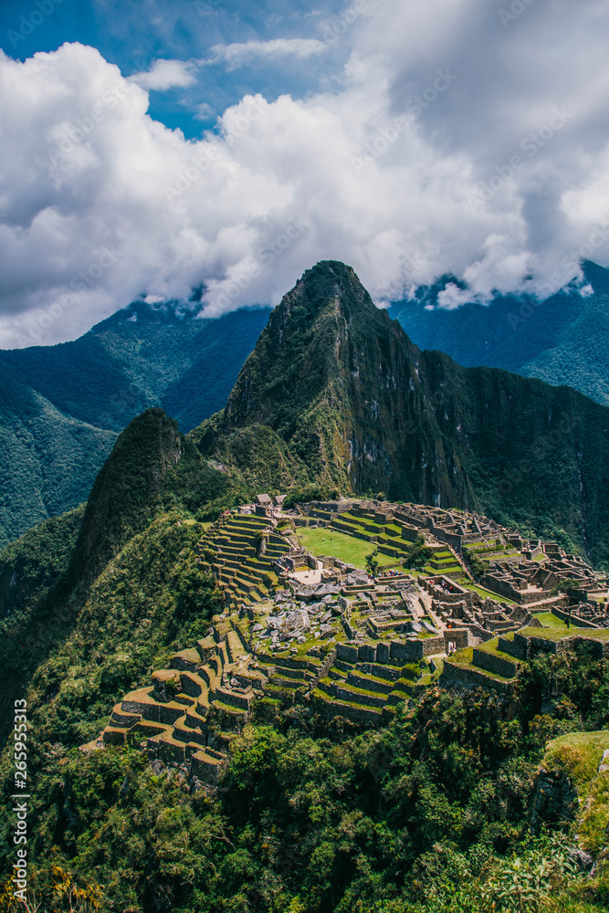 Machu Picchu, the lost city of the Incas on a cloudy day. Machu Picchu ...