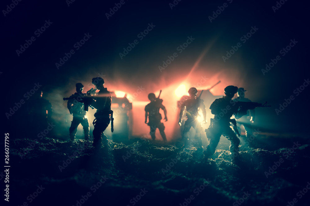 War Concept. Military silhouettes fighting scene on war fog sky ...