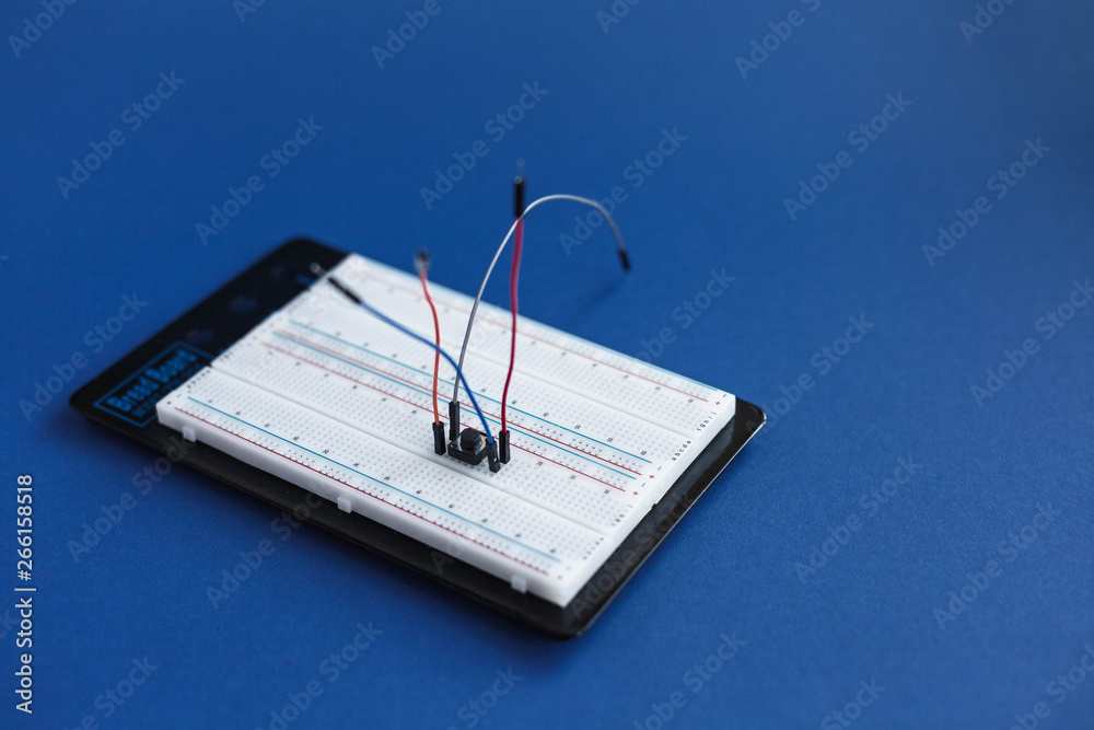 Microcontroller build closeup showing the components, wiring, board ...