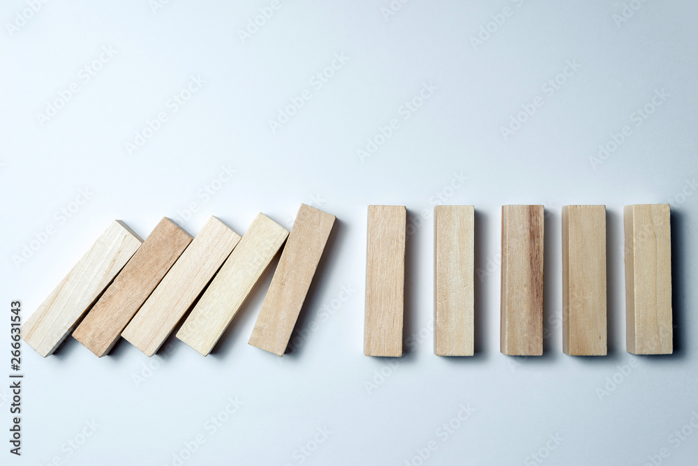 Falling wooden cubes, as a symbol of defeat, wrong decision and ...