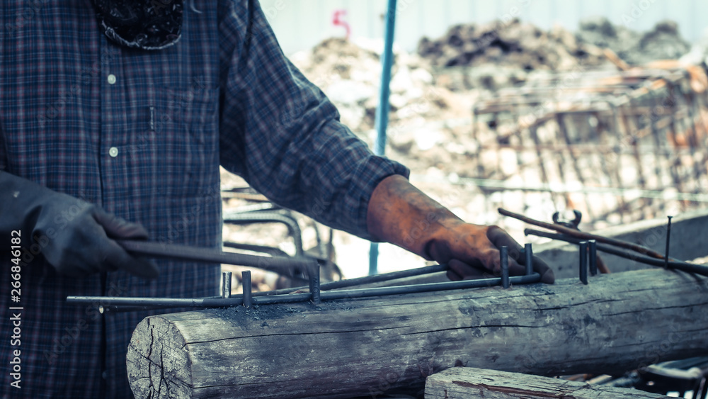 round bar bending steel on construction site for Steel stirrups ...