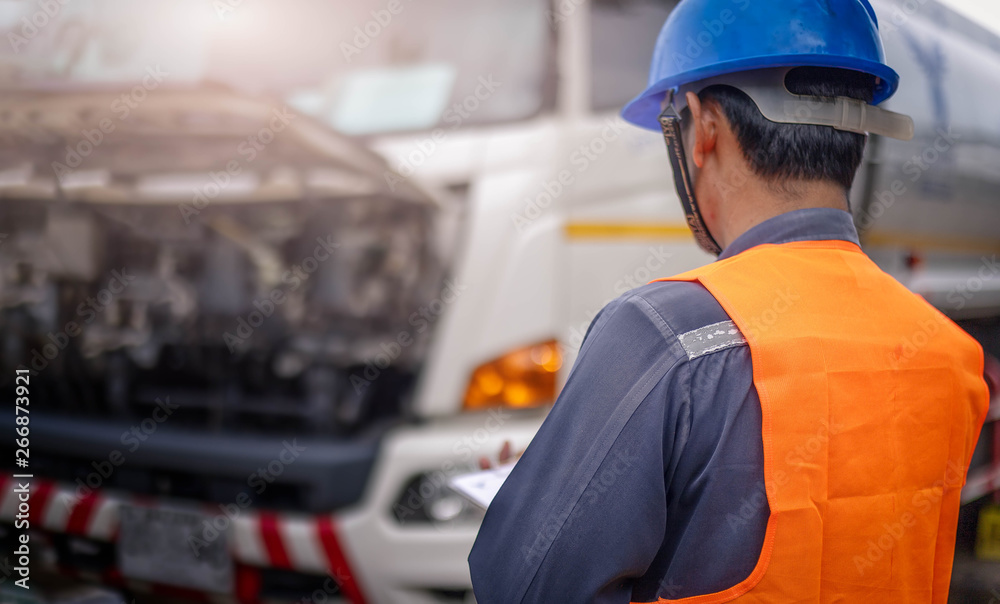 Stock-Foto „Preforming a pre-trip inspection on a truck,Concept ...
