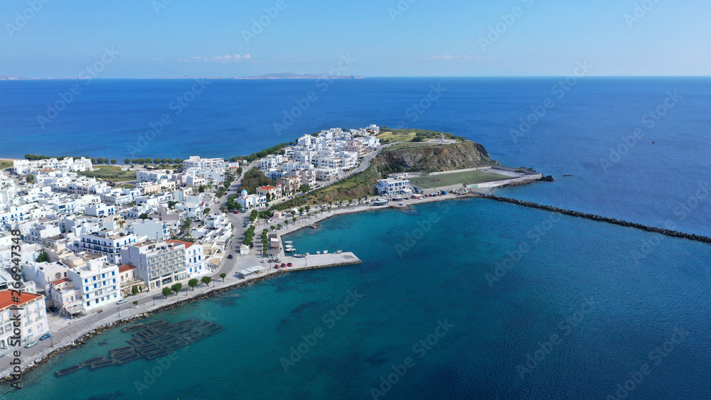 Aerial drone photo of iconic main town and port of Tinos island ...