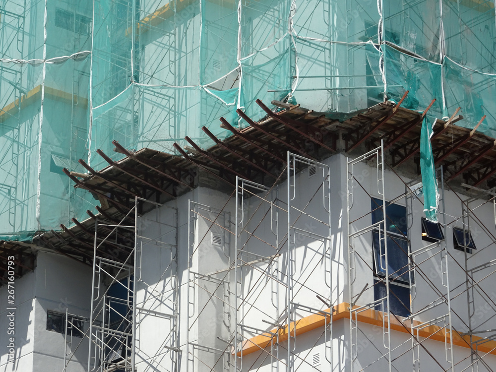 Catch platform and safety netting at the face of the building during ...