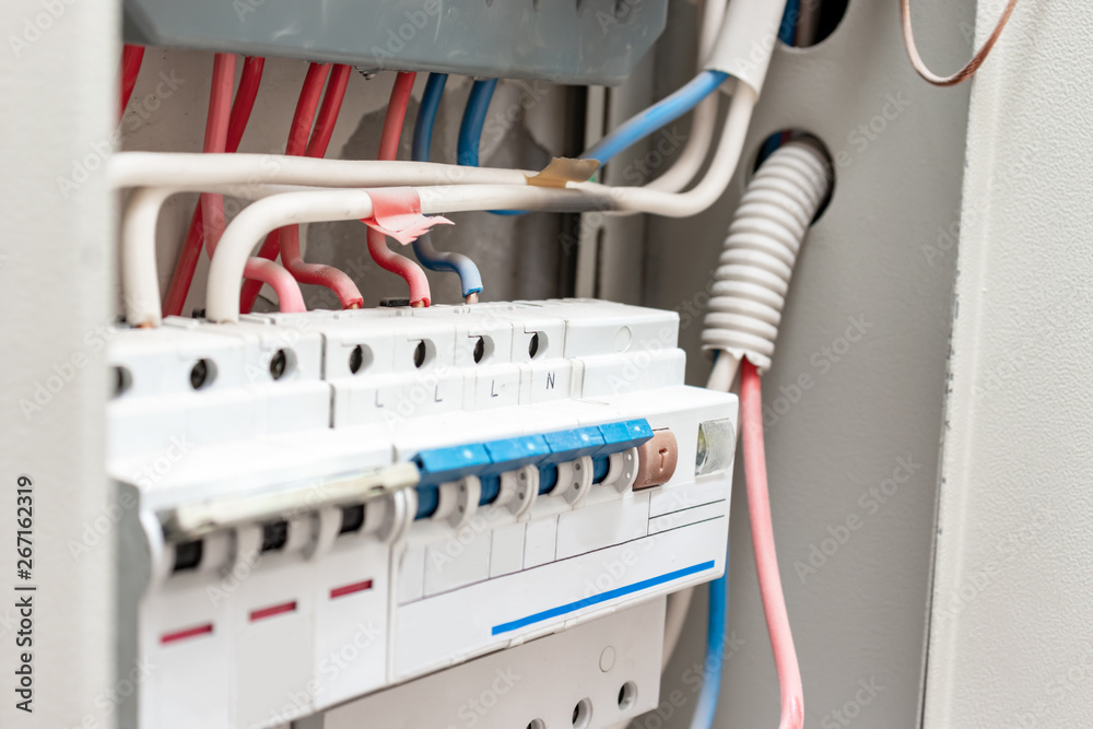 Automatic switches and wires in electrical shield close up Stock Photo ...