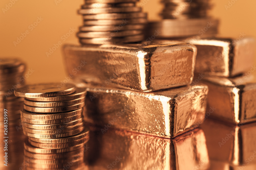 Gold bars and stack of gold coins. Background for finance banking ...