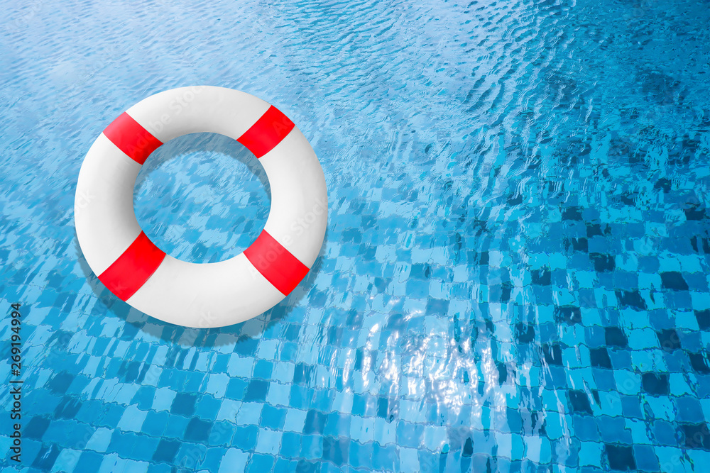 Life Buoy in a Pool Water. Life Belt or Life Preserver Floating on Top ...