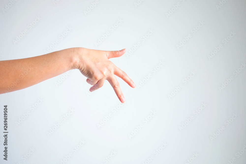 Hand showing thumb, forefinger and middle finger for gesturing like ...