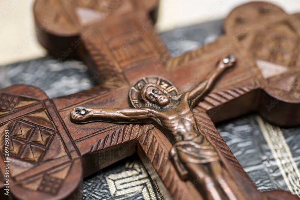 Jesus on the cross in church. Wooden cross with Jesus Christ ...