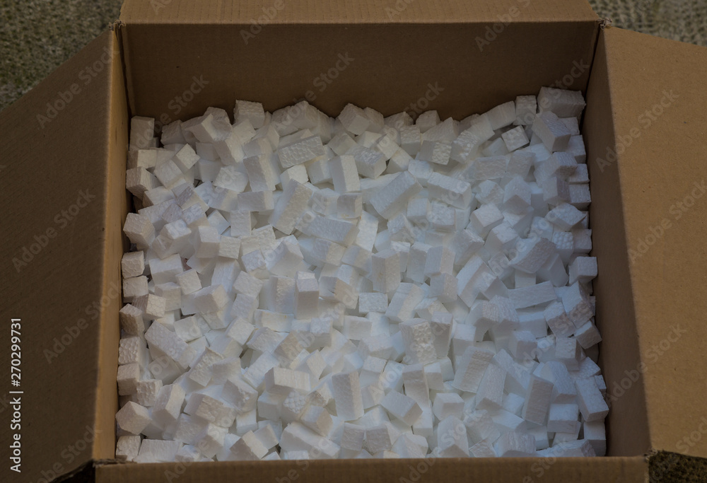 cardboard box with packing foam pellets white polystyrene foam ...