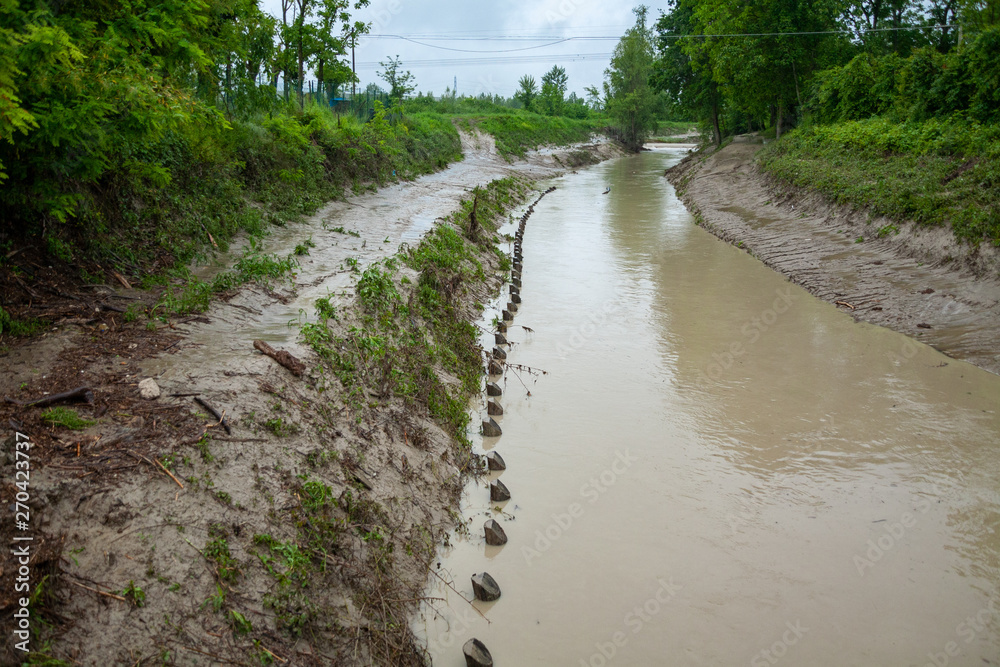 flooding of river embankments reinforcement to delimit the full emilia ...