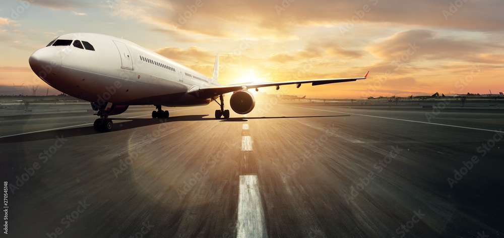 Front view of commercial airplane on runway Stock Photo | Adobe Stock