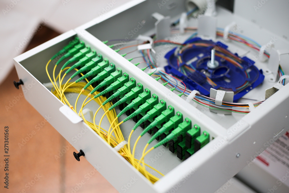 Fiber to the home equipment. FTTH internet fiber optics cables and ...