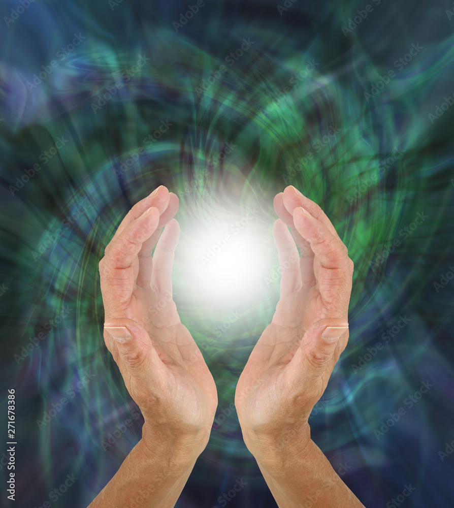 Orb Light Paranormal Phenomenon - hands cupped around a bright white ...