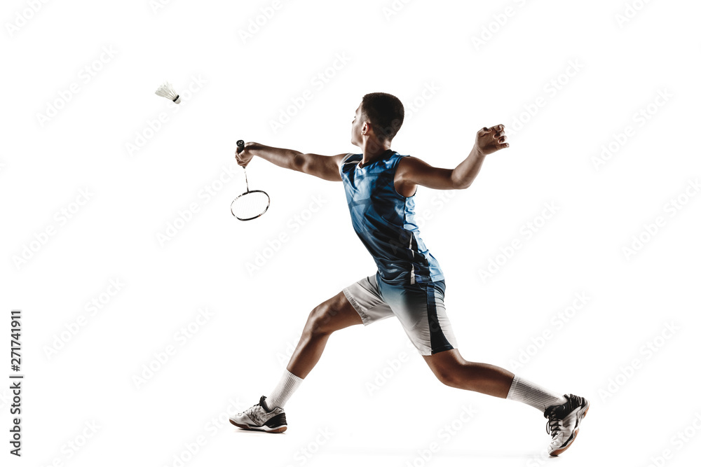 Little boy playing badminton isolated on white studio background. Young ...