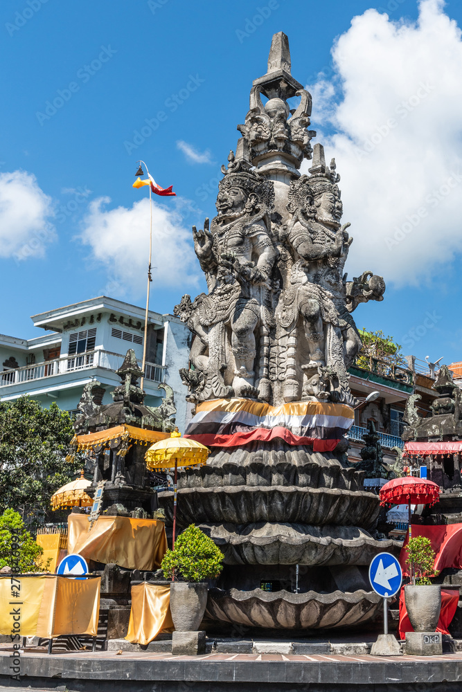 Klungkung, Bali, Indonesia - February 26, 2019: Gray stone Patung Catur ...