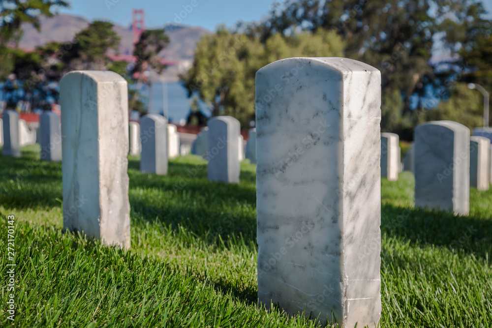Military Tombstones at cemetery with Golden Gate Bridge on the ...