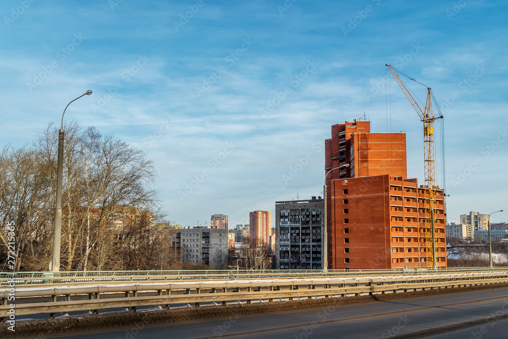 One of the districts of the city of Perm. Behind the road are visible ...