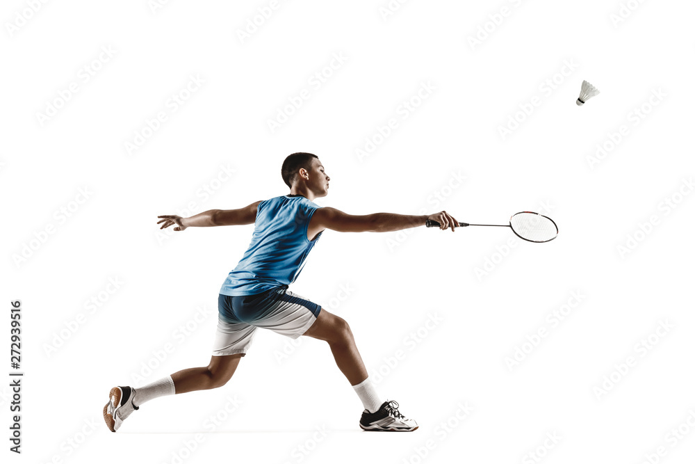 Little boy playing badminton isolated on white studio background. Young ...