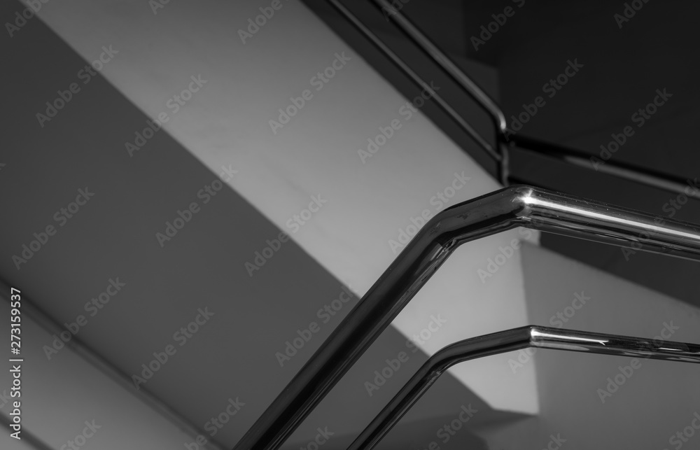 Modern stainless steel railing in house or apartment. Concrete stair ...