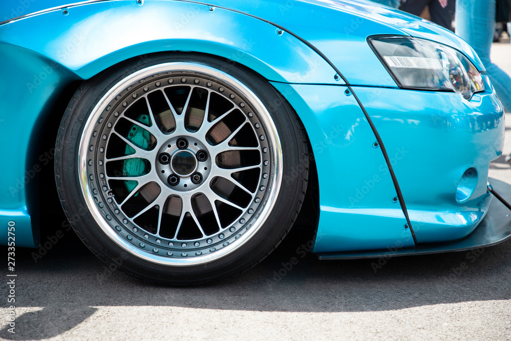 Customized powerful lowered and slammed car with custom rims. Unique ...