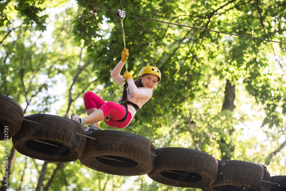 Eco Resort Activities. Climber little girl on training. Children fun ...