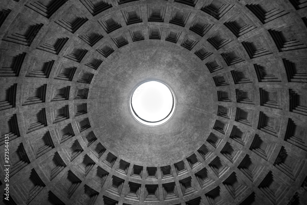 The concentric circle ceiling pattern of the Pantheon, a former Roman temple and now a church ...