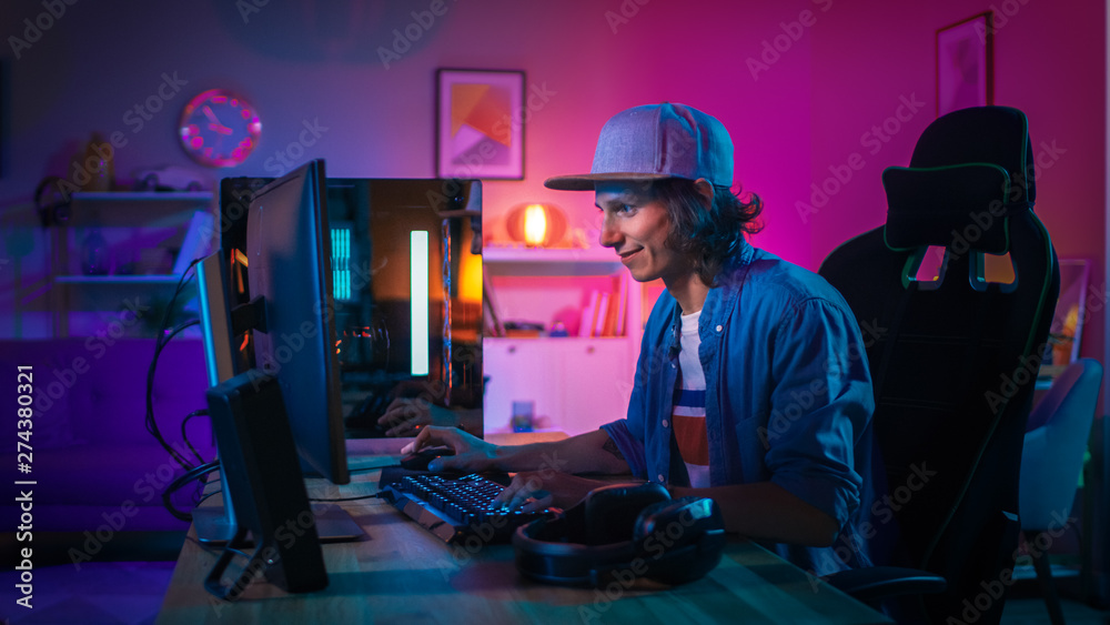 Professional Gamer Playing First-Person Shooter Online Video Game on ...