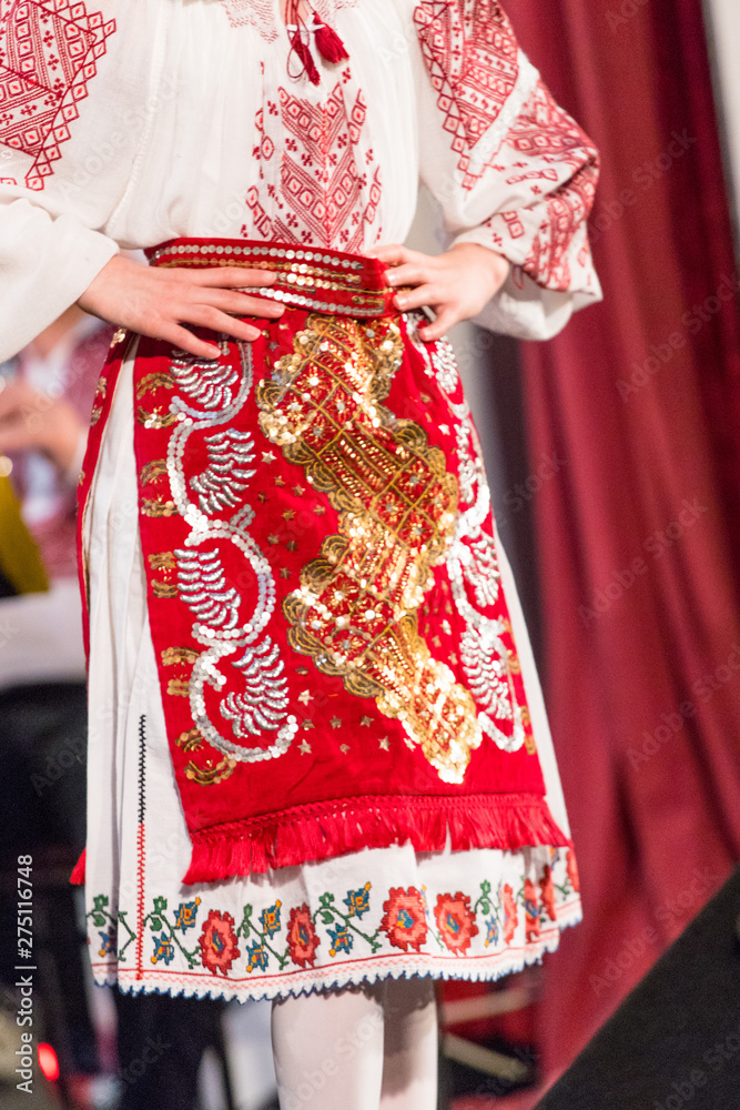 Detail of traditional folkloric costume of Romanian dancers perform a ...