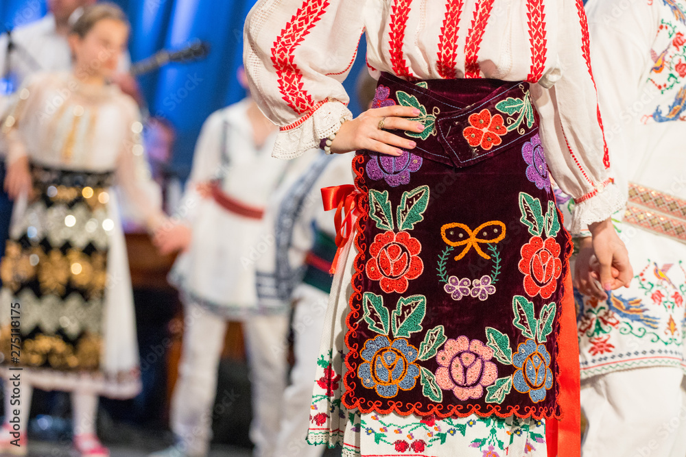 Close up s of young Romanian dancers perform a folk dance in ...