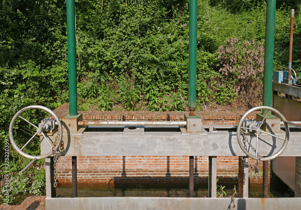 sluice gate water channel Stock Photo | Adobe Stock