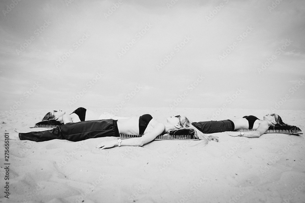 extreme yoga relaxation and self-development - beautiful women laying ...