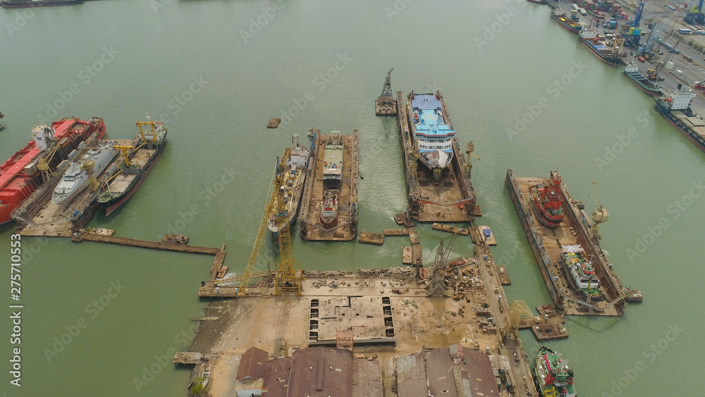 aerial view cargo and passenger seaport with ships and crane Tanjung ...