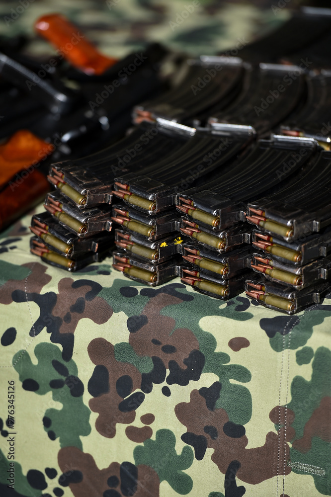 Assault rifle round magazine loaders in a shooting range Stock Photo ...
