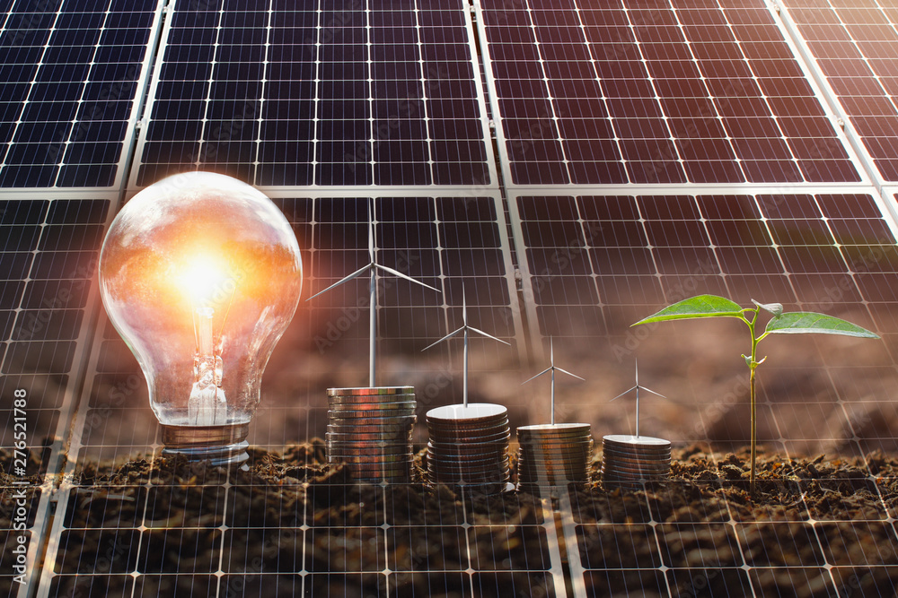 concept clean energy and saving power in nature. solar panel with wind ...