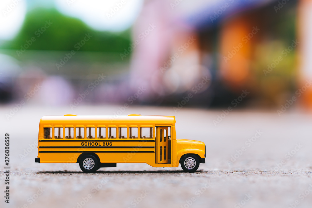Miniature of yellow school bus on the road Stock Photo | Adobe Stock