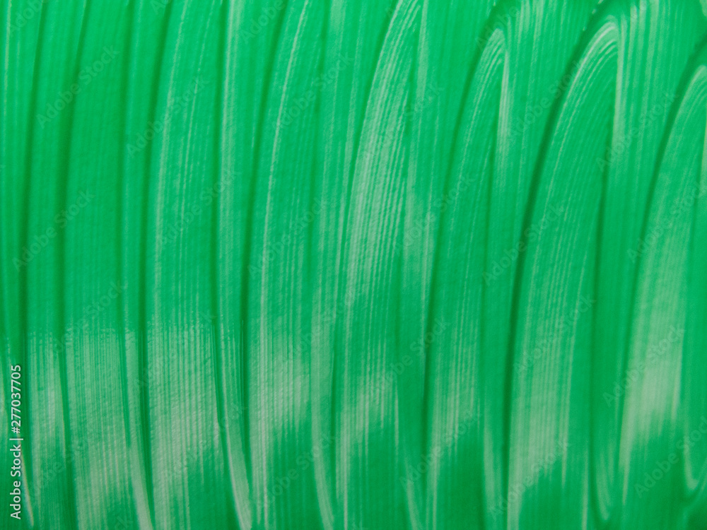 Lines of green paint strokes with volume effect Stock Photo | Adobe Stock